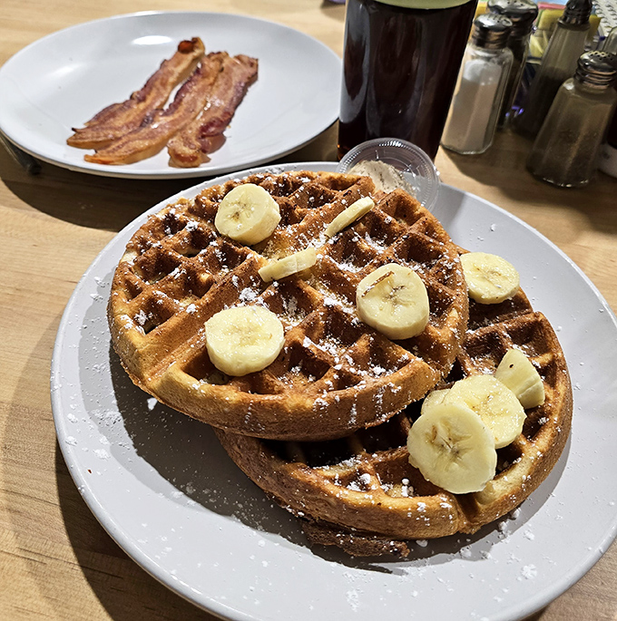 These waffles don't need a Belgian passport to prove their authenticity&mdash;just bananas, powdered sugar, and your immediate attention.