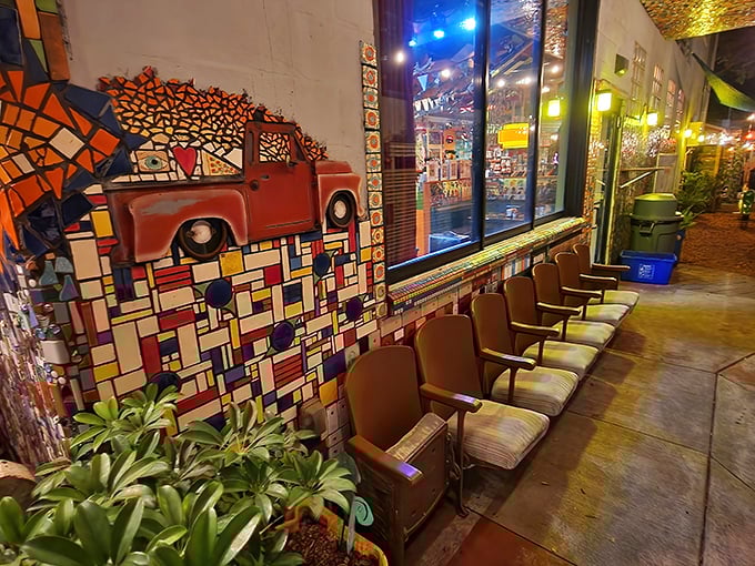 The waiting area doubles as an art gallery, proving that anticipation for great pizza is actually a form of entertainment.