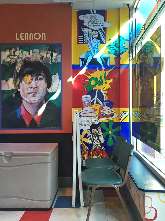 Even John Lennon seems impressed by the breakfast magic happening here, watching over diners from his colorful wall mural.