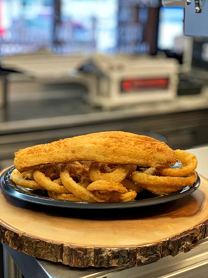 The walleye sandwich&mdash;a Midwest masterpiece served on what appears to be a slice of tree. Nature's plate for nature's bounty.