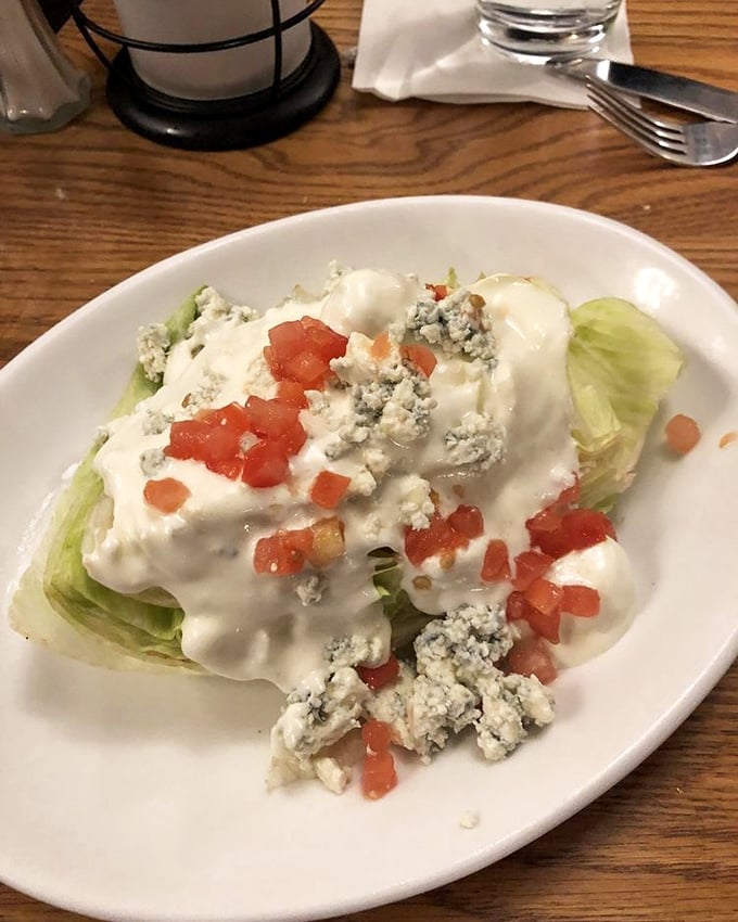 The wedge salad&mdash;that retro steakhouse classic that proves sometimes the simplest combinations (crisp lettuce, creamy dressing, blue cheese, tomato) create the most satisfying bites.