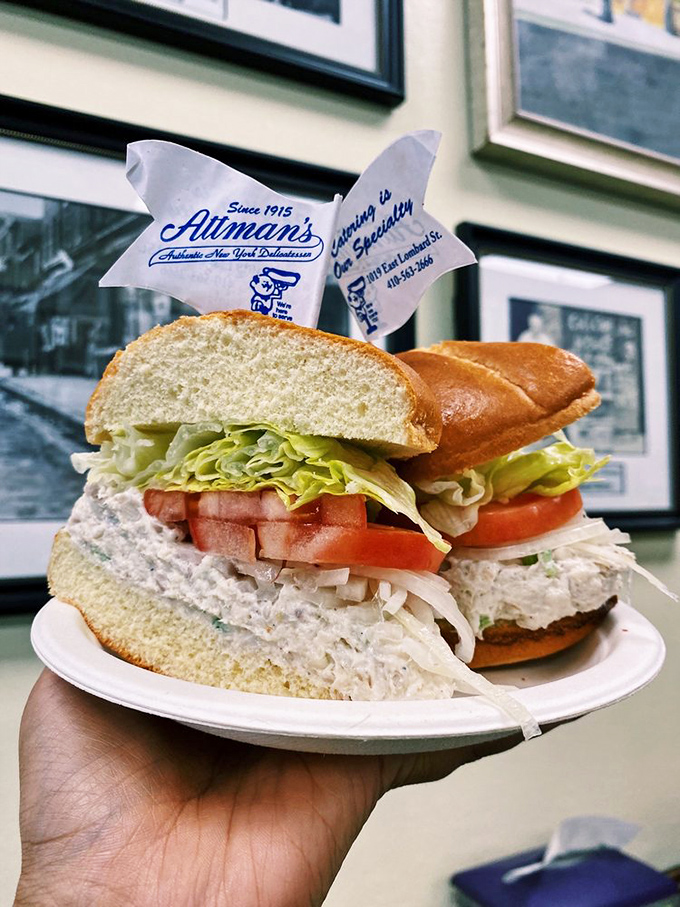 This isn't just lunch; it's a towering testament to the art of sandwich-making where every ingredient plays its part in perfect harmony.