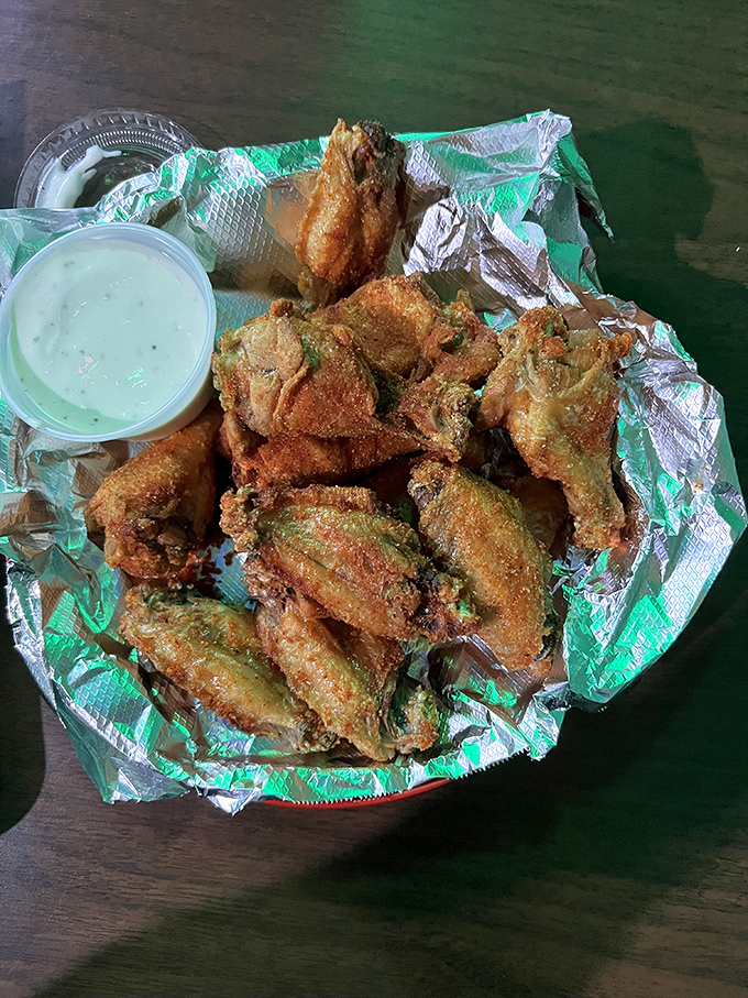 Wings that could make Buffalo jealous, served with the kind of ranch dressing that deserves its own fan club.
