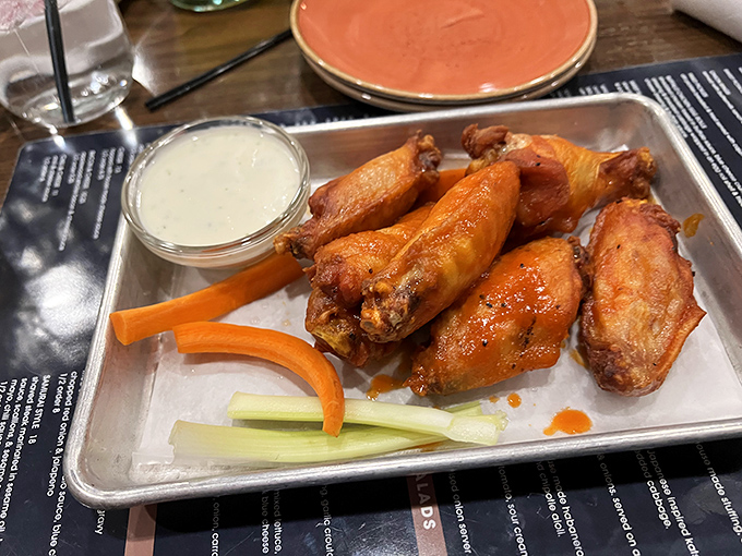 Wings that have achieved that mythical balance&mdash;crispy exterior, juicy interior, and a sauce that should be bottled and sold as liquid gold.