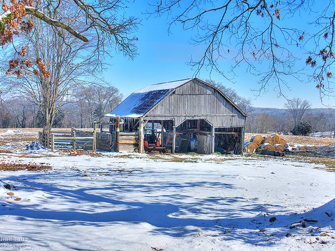 Even under a blanket of snow, Cookeville's rural charm shines through with weathered barns and rolling hills creating a winter wonderland.