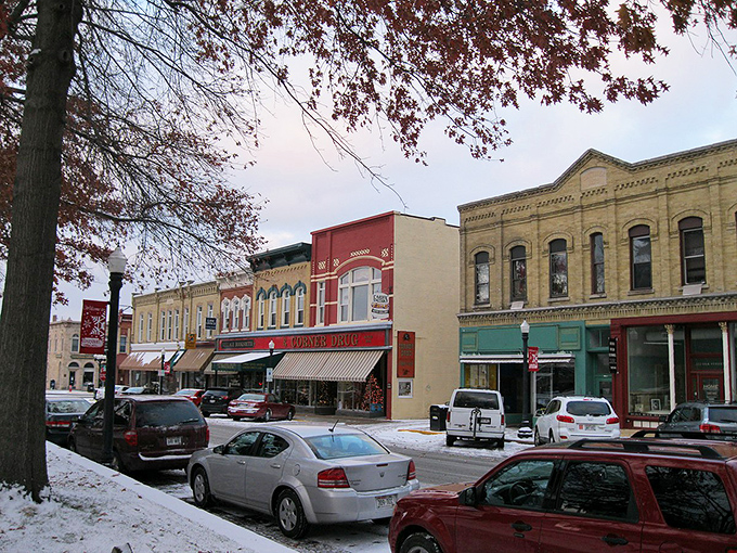 Winter in downtown Baraboo wraps historic buildings in a blanket of snow, creating a scene so quaint it belongs on a holiday card or inside a snow globe.