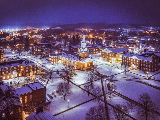 The college campus in winter looks like someone sprinkled powdered sugar on a gingerbread village. Those students are getting an education in postcard-worthy scenery.