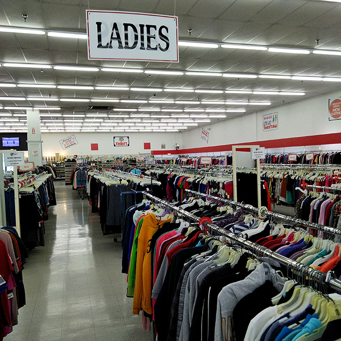 The ladies' section: a color-coded journey through decades of fashion where vintage meets value.