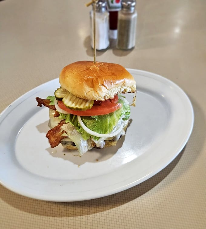 A burger built with purpose and precision. Every ingredient earns its place in this towering testament to American sandwich craftsmanship.