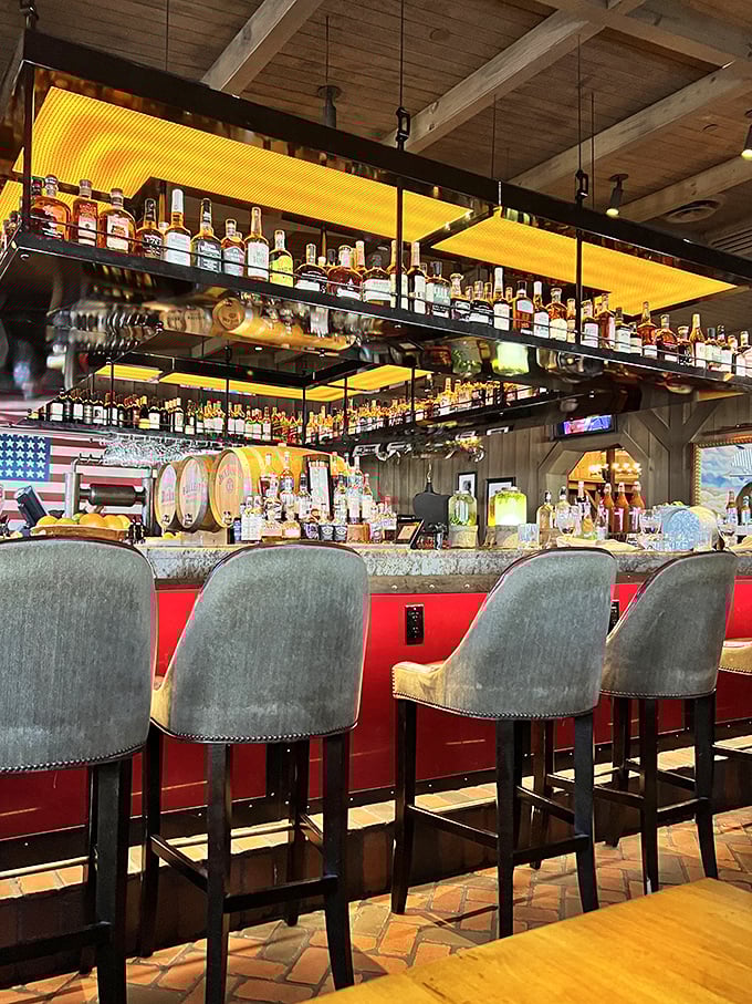 This bar doesn't just serve drinks&mdash;it showcases them like the liquid treasures they are. The amber lighting makes everyone look 10 years younger.