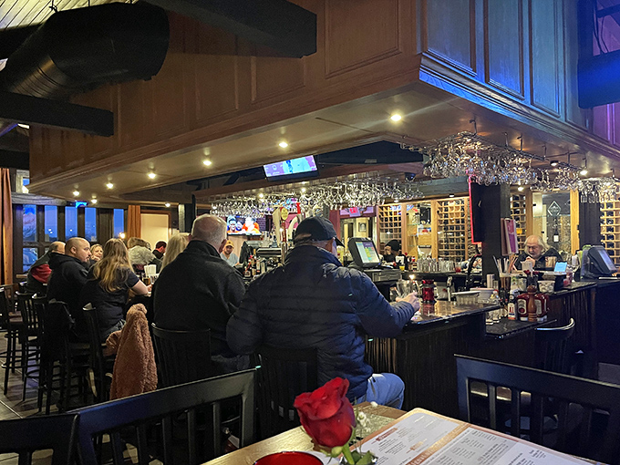 The bar buzzes with energy as patrons gather, proving that anticipation of great steak pairs perfectly with a well-crafted cocktail.