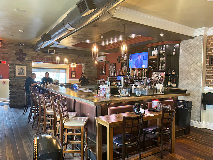 A bar area that says "stay awhile" without having to say a word. Those wooden stools have supported many an elbow during stories and second rounds.