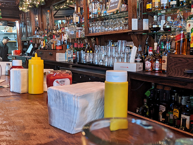 A bar that's seen it all, from struggling artists to Wall Street celebrations. The bottles stand ready, like old friends waiting to catch up.