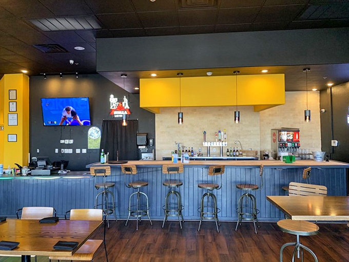 The bar area invites you to pull up a stool and stay awhile&mdash;because burgers taste better when there's no rush.