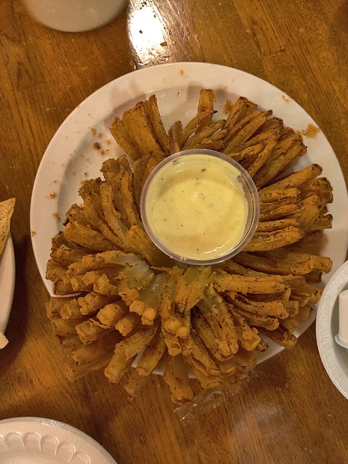 The blooming onion&mdash;a flower that blooms not in spring but in hot oil, creating a crispy, petal-like experience that's impossible to stop eating. 