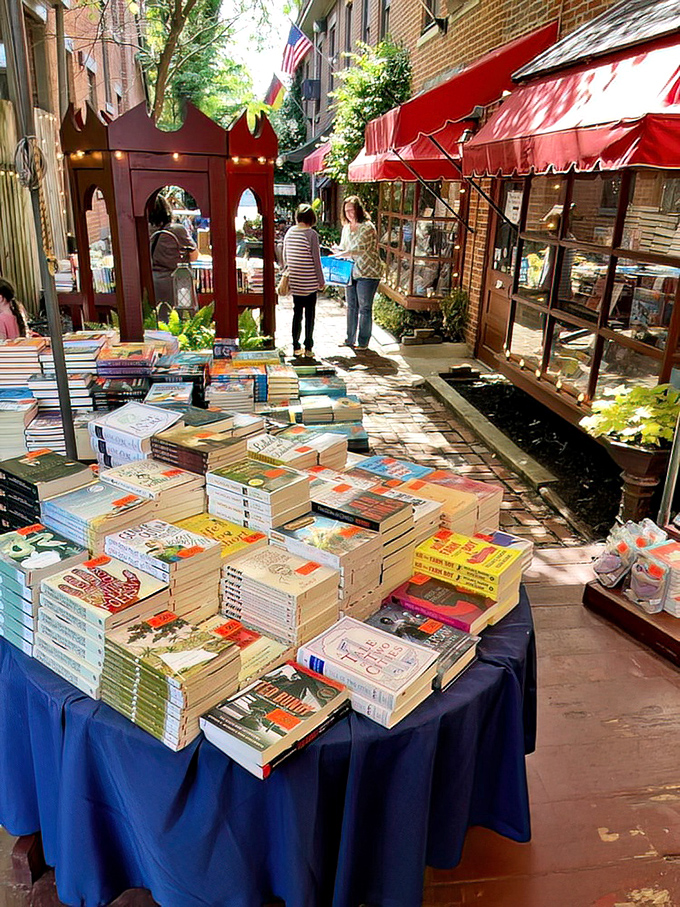Outdoor book displays prove that literary temptation works in broad daylight too. These tables of bargains have separated many visitors from their vacation money.