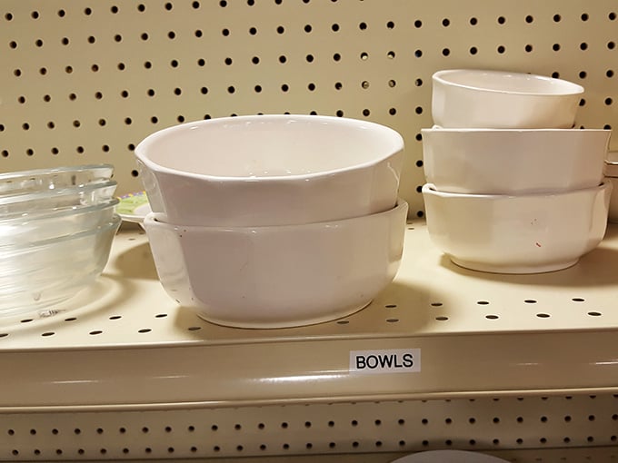 Simple white bowls await new homes and dinner parties. Sometimes the most basic kitchen items make the most satisfying finds.