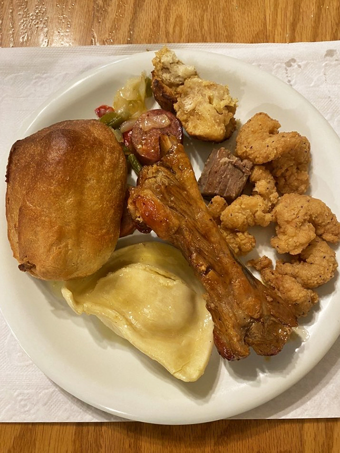 A plate from the buffet that tells the story of American comfort food&mdash;where every item touches its neighbor in delicious harmony.