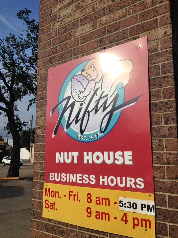 The squirrel mascot grins knowingly from the business hours sign. He understands your nut obsession because he shares it.