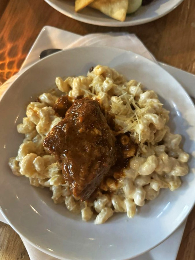 Short rib mac and cheese: where comfort food meets luxury. It's like the pasta is wearing a tuxedo made of braised beef.