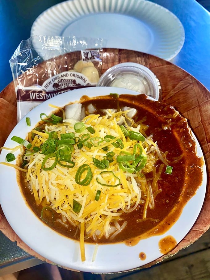 A bowl of hearty chili topped with cheese and green onions &ndash; comfort food that works surprisingly well even in Florida's warm climate.