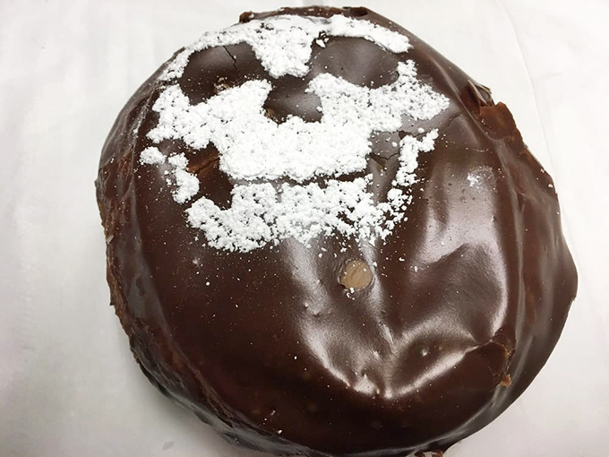 That chocolate glaze achieves the perfect balance between rich indulgence and artistic presentation that photographs beautifully.