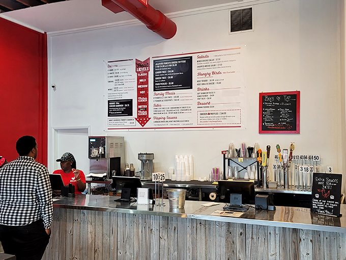 The ordering counter&mdash;where dreams are articulated, heat levels are negotiated, and life-changing chicken decisions are made daily.