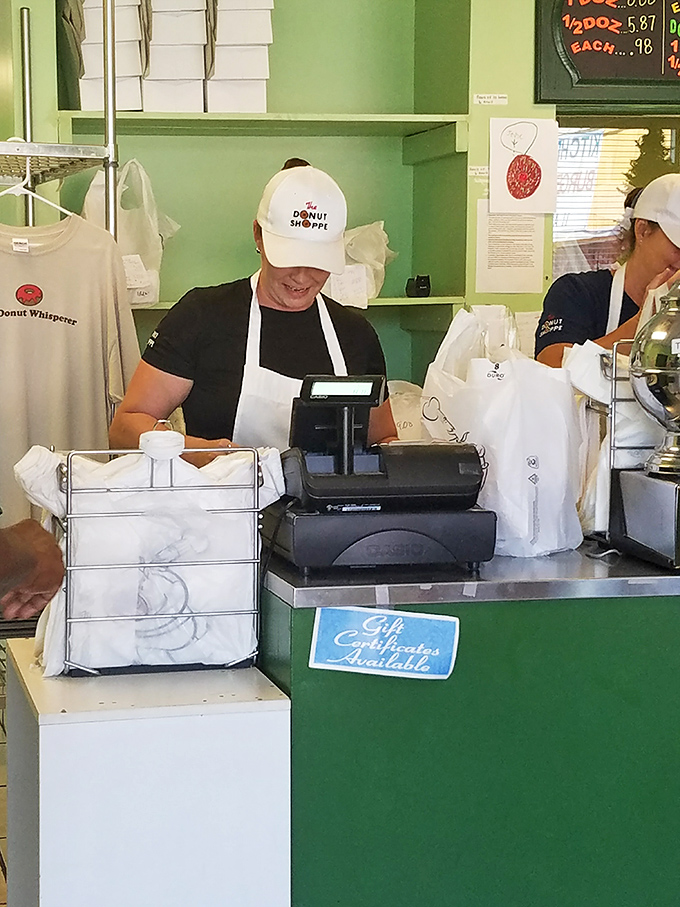 The counter—that magical threshold where money transforms into donuts. A fair exchange if there ever was one.
