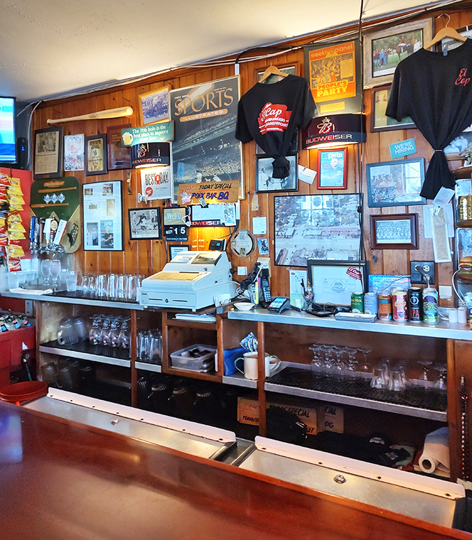 Wood paneling and sports memorabilia create the atmosphere that fancy restaurants spend thousands trying to manufacture. This is the real deal.