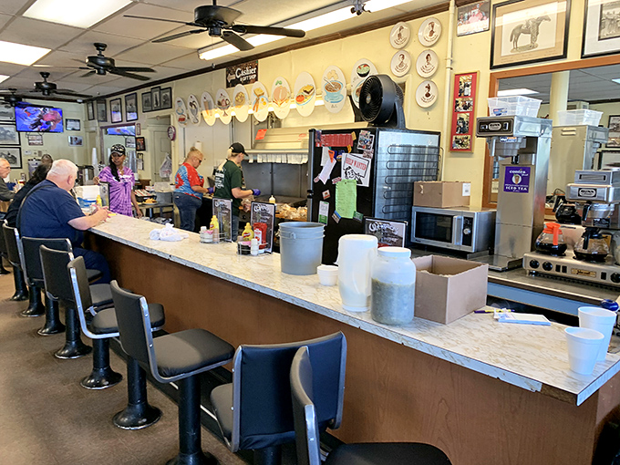 The counter at Wagner's—where racing tips are exchanged as freely as the coffee refills. The best seats in the house for authentic Louisville culture.