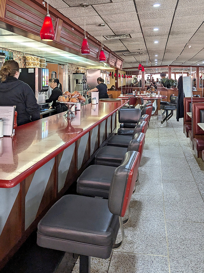 Counter seating: where solo diners become part of the diner family and the coffee refills come with a side of local wisdom.