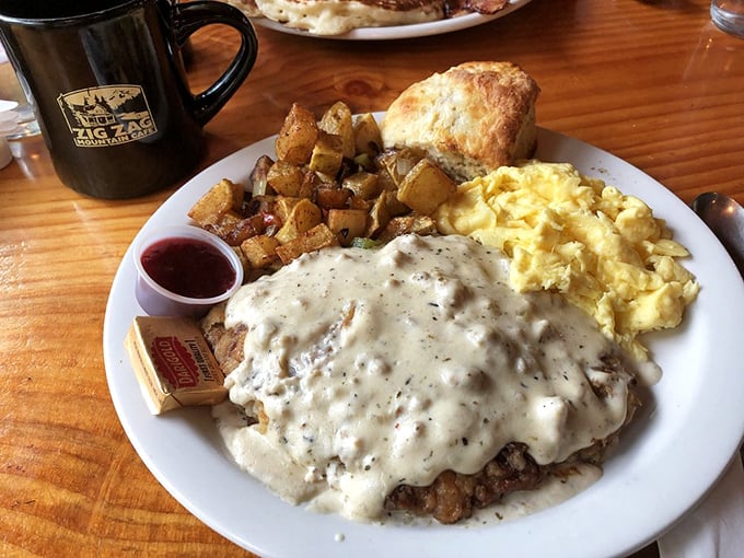 Country fried steak swimming in gravy so good you'll contemplate drinking it like a shameless soup.