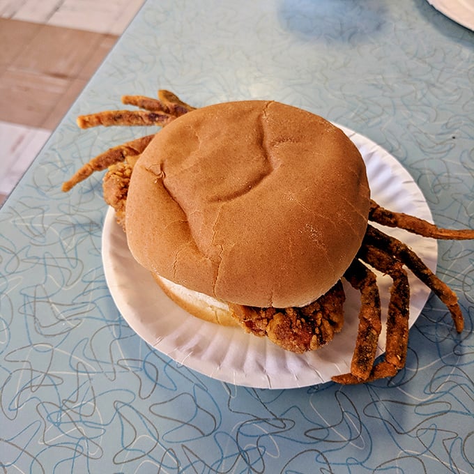 The soft shell crab sandwich transforms a Chesapeake Bay delicacy into portable beach food, proving that sometimes the best dining rooms have no walls.