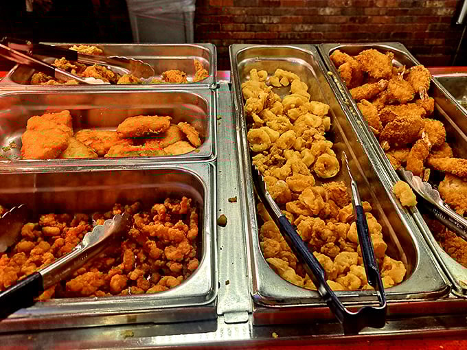 The fried seafood section: where golden, crispy perfection awaits those who believe that anything is improved by a dip in hot oil.