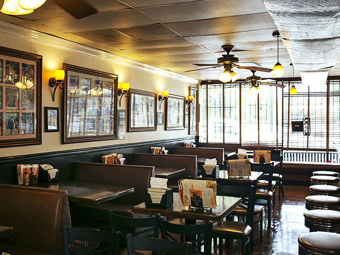 A dining room that feels more like your favorite aunt's house than a restaurant. The warm lighting and wood paneling create an atmosphere where strangers become friends over shared plates.