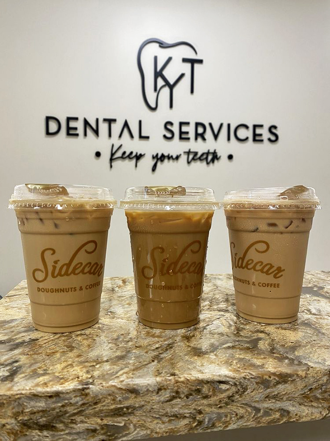 Iced coffees waiting to meet their donut soulmates. The perfect supporting actors in the grand production of breakfast bliss.