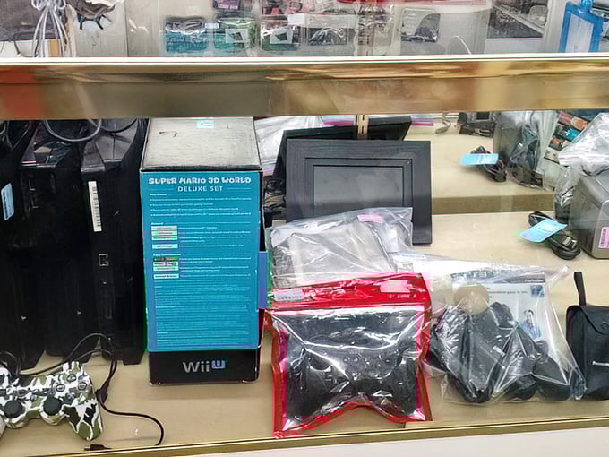 Gaming treasures behind glass&mdash;where nostalgic millennials and curious kids converge. That Super Mario set has brought more joy than most modern smartphones.