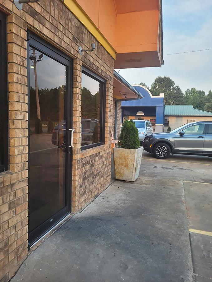 This entrance has seen thousands of hungry arrivals and satisfied departures. The simple doorway belies the flavor explosion waiting on the other side.