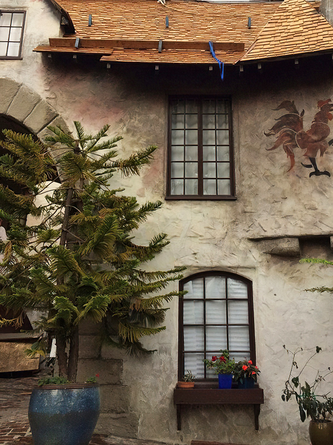 Decorative symbols and artistic touches prove that even fairy-tale villages need a little mystical flair.