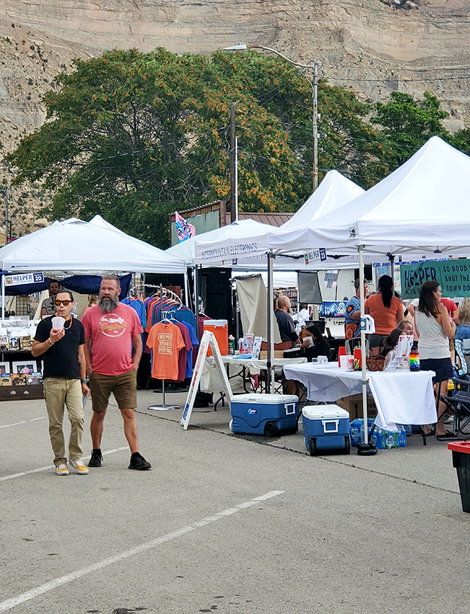 The Helper Arts Festival transforms Main Street into an open-air marketplace where local creativity flourishes under the watchful gaze of ancient cliffs.