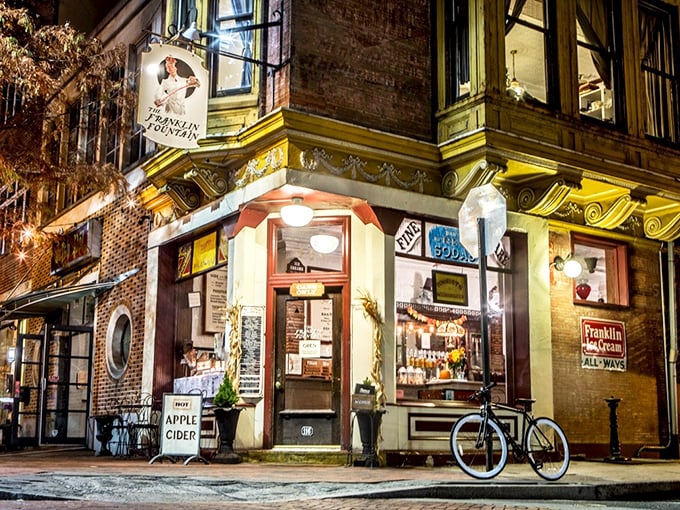 At night, The Franklin Fountain glows like a beacon of sweetness in Philadelphia's historic district. Even the bicycle parked outside looks nostalgic.