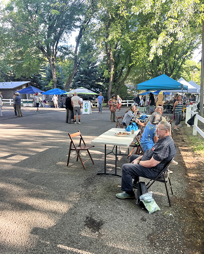 The farmers market isn't just shopping—it's a weekly social institution where the produce is as fresh as the gossip and twice as nourishing.