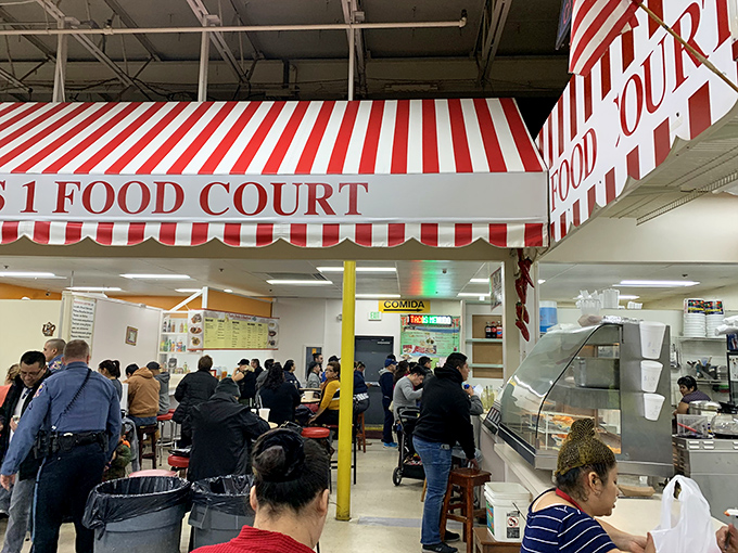 The bustling food court serves as both refueling station and social hub, where shopping strategies are planned over authentic international cuisine.