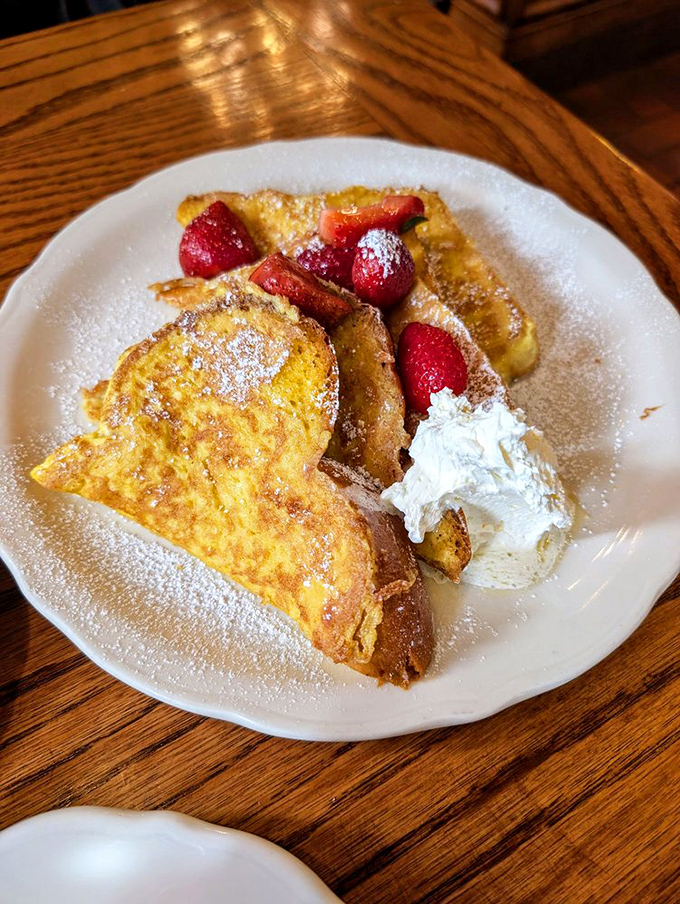 French toast that makes you want to stand up and salute&mdash;crisp edges, custardy centers, and fresh strawberries playing supporting roles.