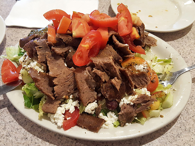 A Greek salad topped with enough meat to make a carnivore weep with joy. Those bright tomatoes and crumbles of feta create the perfect Mediterranean melody.