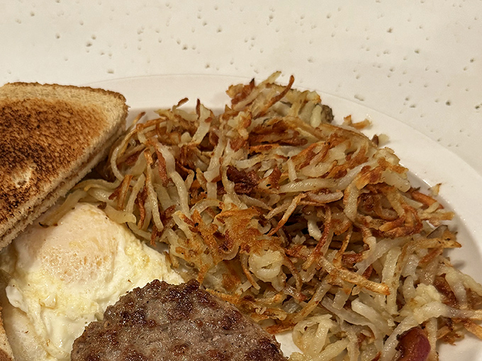 Hash browns with the golden-brown crispiness that makes you wonder if potatoes were put on earth specifically for this purpose.