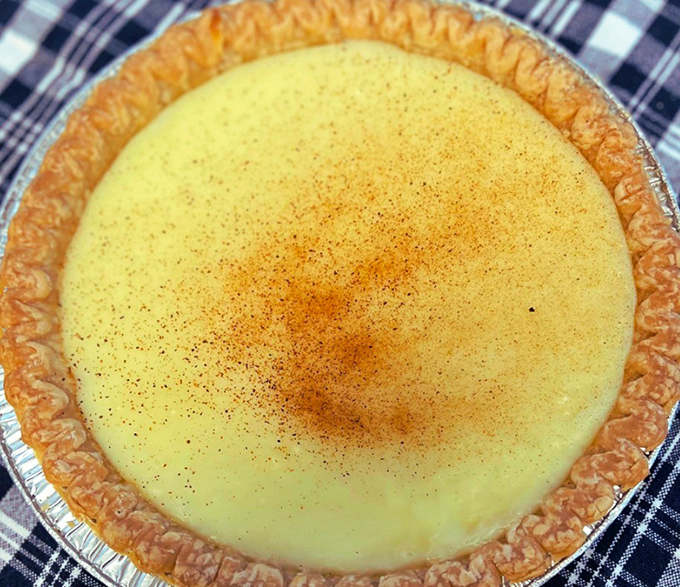 A custard pie dusted with cinnamon that whispers, "Cancel your plans for the next fifteen minutes. You and I have important business."