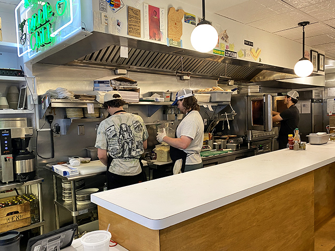 Where the magic happens! The open kitchen design lets you witness sandwich artistry in action as skilled hands transform simple ingredients into edible masterpieces.
