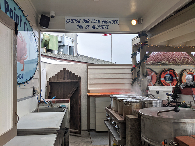 The kitchen where magic happens, complete with a warning sign that their clam chowder "can be addictive"&mdash;the most honest advertising ever.