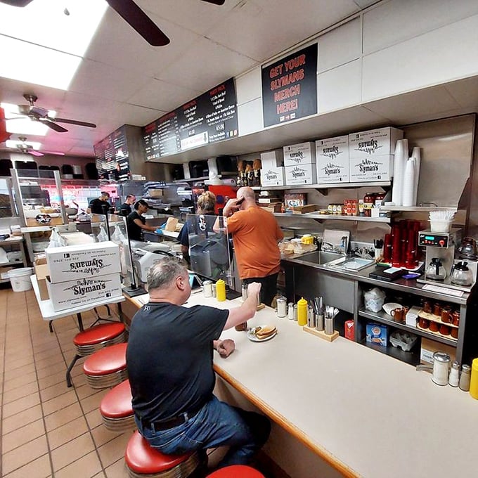 The kitchen counter—where sandwich magic happens at lightning speed. Like watching Olympic athletes, but with more corned beef.